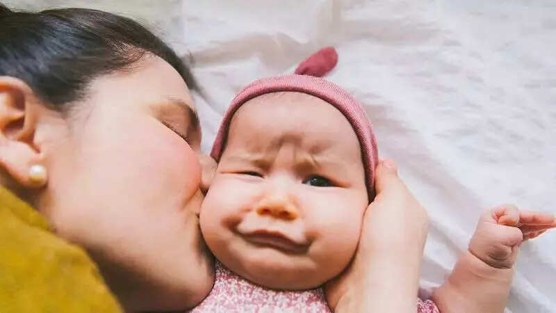 Wanting to bite the baby is a thing. Its called cute aggression! Find out