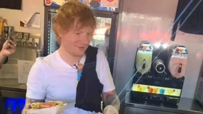 Ed Sheeran trends as he works at the Wieners Circle, learns and serves ...