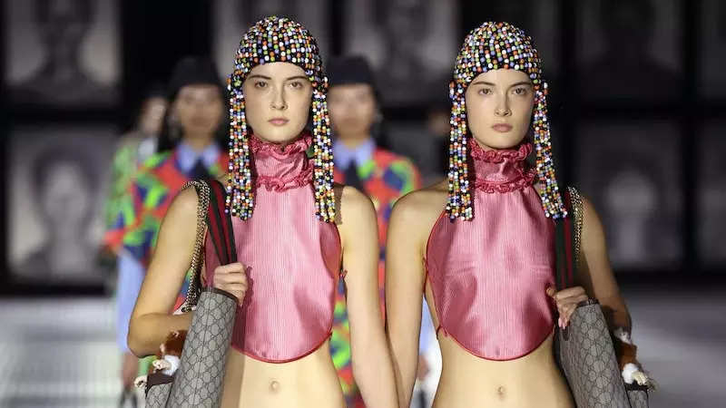 Gucci creates history at Milan Fashion Week with 68 identical twins ...