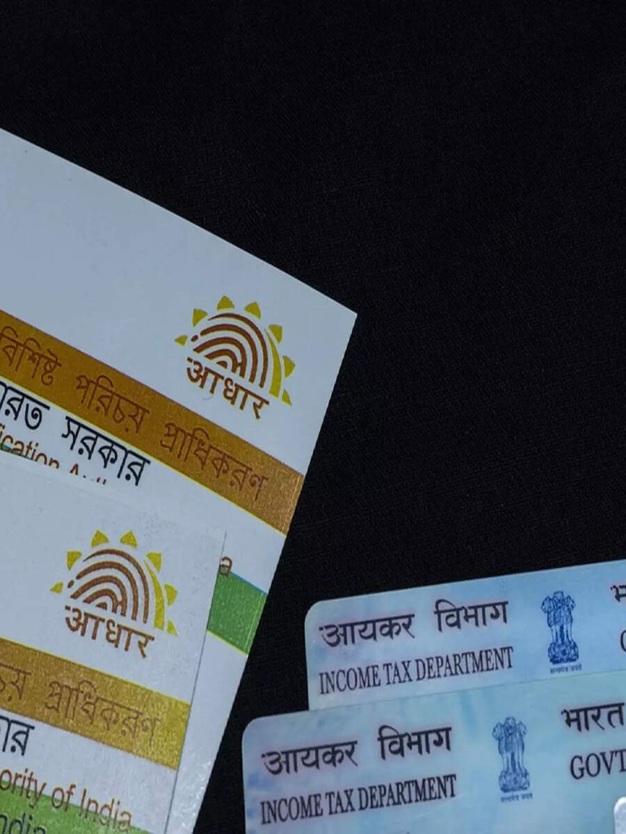 Quick guide to link Aadhaar-PAN card with penalty | Times Now